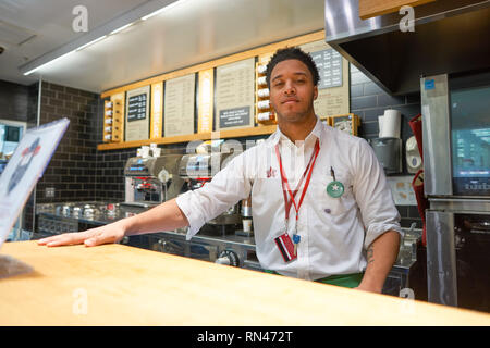 Pret a Manger service counter with Barista making coffee - Pret is a ...