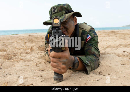 Royal Thai reconnaissance Marines storm a beach during an amphibious ...