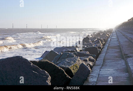 Sea wall at Sea Palling, Norfolk, UK, built as a sea defence to protect ...