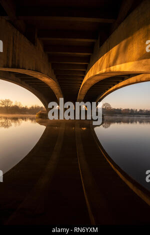 Sunrise beneath the stone bridge on the River Trent at Gunthorpe in ...