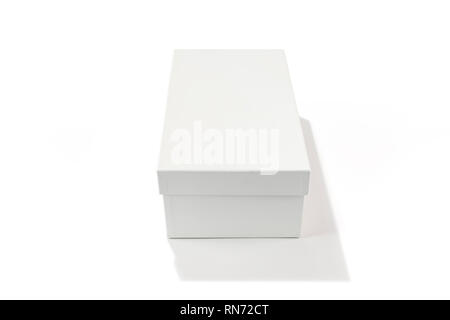 Closed plain white shoebox mock-up on white background. Top side view ...