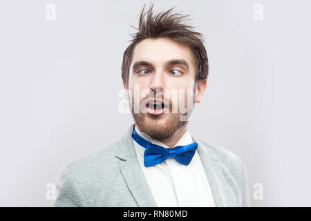 Cross-eyed man in suit. White background, full body Stock Photo - Alamy