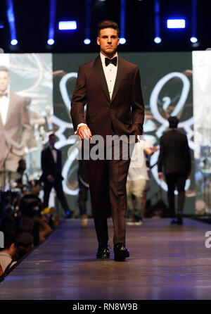 male fashion model walking runway catwalk night Stock Photo - Alamy