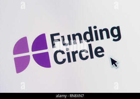 The logo of Funding Circle is seen on a screen of a smartphone next to ...