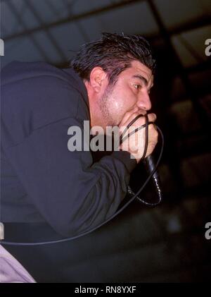 Deftones vocalist Chino Moreno is shown singing on stage during a "live ...