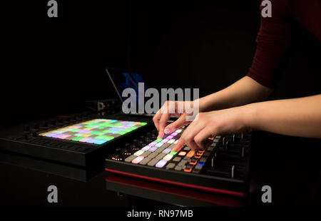 Hand remixing music on midi controller with play music and multimedia ...