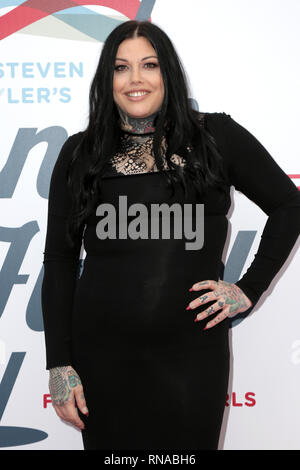LOS ANGELES, CA - FEBRUARY 4: Mia Farrow with Ronan Farrow and Isaiah ...
