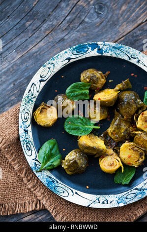 Baked Brussels sprouts with turmeric Stock Photo - Alamy