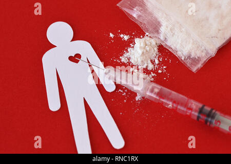 Concept of drug addiction and substance dependence as a junkie symbol ...