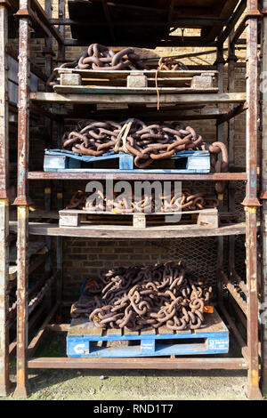 Industrial chains on rack Stock Photo - Alamy