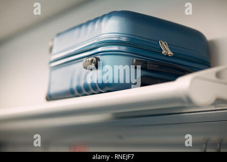 Luggage on shelf railway train. Holiday vacation, tourism, travel ...