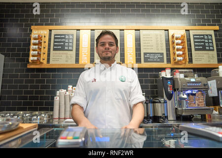 Pret a Manger service counter with Barista making coffee - Pret is a ...