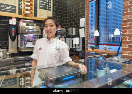 Pret a Manger service counter with Barista making coffee - Pret is a ...