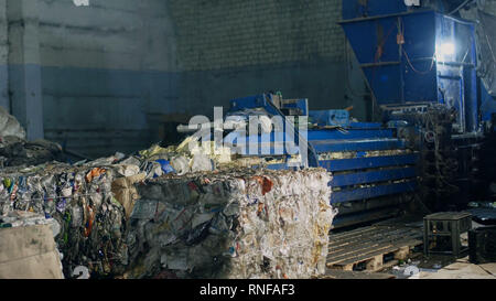 Compacted cardboard waste for recycling industry Stock Photo - Alamy