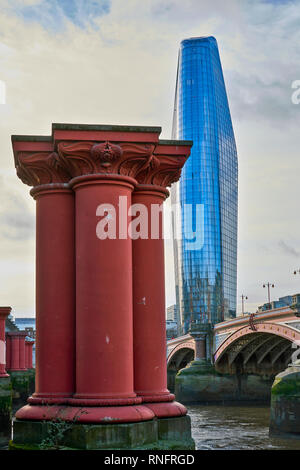 Blackfriars Railway Bridge, London. Red pillars are remains of grade II ...
