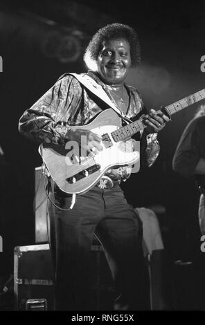 Musician Albert Collins is shown playing his guitar during a "live ...