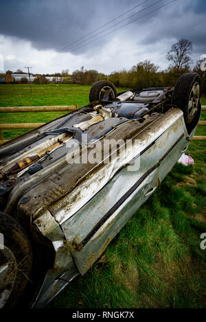 Car Crash and Car Damage. Vehicle rolled over in a field after a high ...