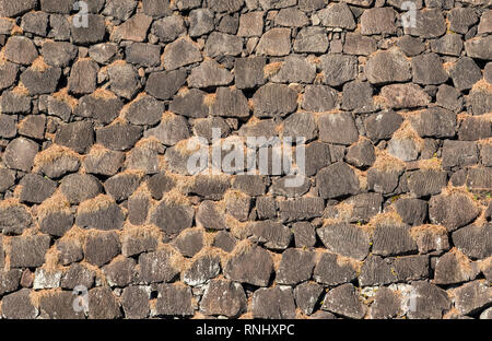 Ancient japanese stone wall made of rocks as background Stock Photo - Alamy