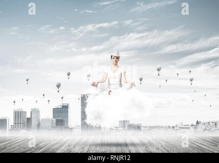 Young woman keeping mind conscious Stock Photo - Alamy