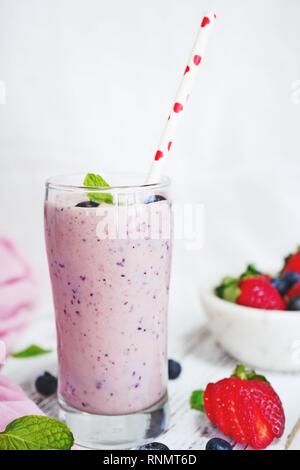 Blueberry and strawberry mix healthy smoothie on the table Stock Photo ...