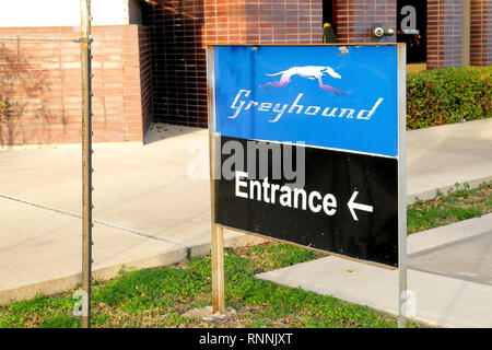 Greyhound Bus line depot entrance sign on a rainy day; Bryan, Texas ...