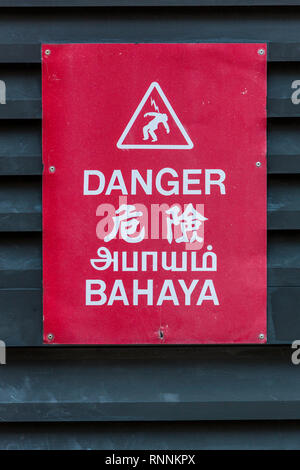 Danger Sign in Four Languages, English, Chinese, Malaysian, Tamil ...