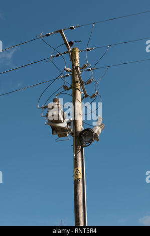 Three phase electricity pylon and transformer Stock Photo - Alamy