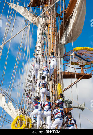 Crew climbing the rigging of Mexican navy training ship, Cuauhtemoc ...
