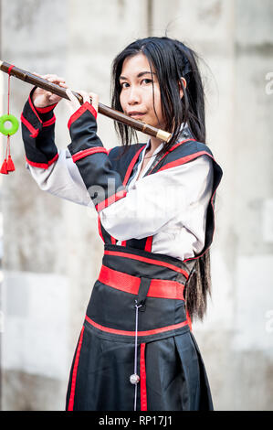 Teenager playing flute Stock Photo - Alamy