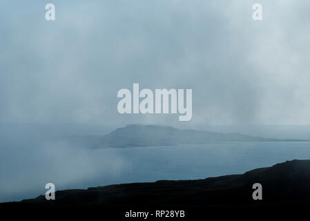 Misty cloud on coast of Isle of Skye Scotland Stock Photo - Alamy