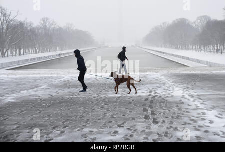 People walk near the Lincoln Memorial Reflecting Pool, Tuesday, June 30 ...