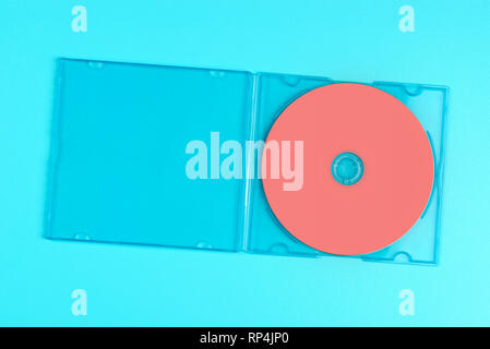 Pastel pink cd in case on pastel pink background. Color of the year ...