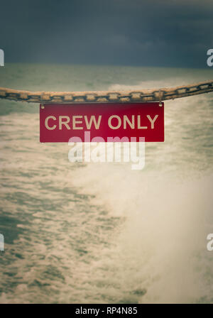 Crew Only sign Stock Photo - Alamy