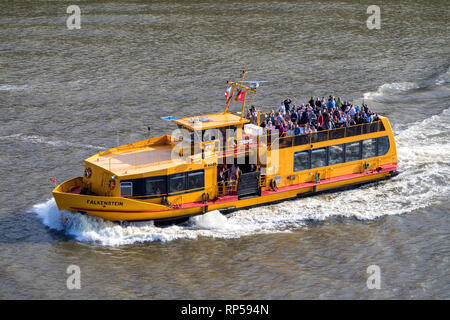 Hadag harbor ferry on the Elbe, Docklands building at the fishing port ...