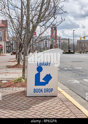 Library book drop box on a city street, curb side, in Montgomery ...