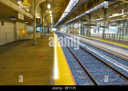 Toronto Union Station tracks with a VIA Rail locomotive and a Go Stock ...
