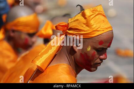 Kathmandu, Nepal. 21st Feb, 2019. Hindu boys attend a religious ritual ...