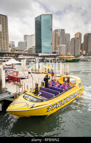 Thunder jet boat on sydney harbour full of passengers out for the ...