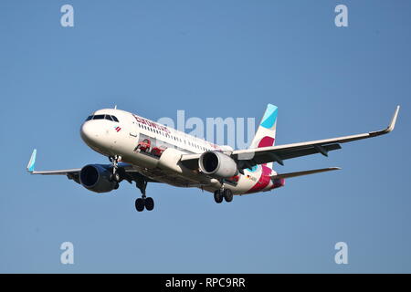 Eurowings Airbus A320 D-AEWS in Avis livery landing at London Heathrow ...