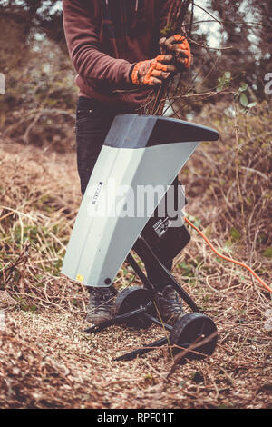 Man Using Chipping Machine Stock Photo - Alamy