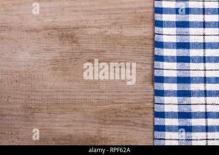 Blue checkered tablecloth on an old wooden table. Top view Stock Photo ...