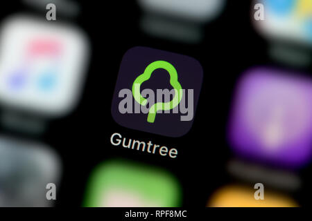 A close-up shot of the Gumtree app icon, as seen on the screen of a ...