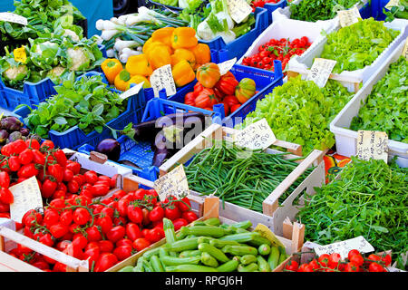 Bunch of organic vegetables sold on market stall Stock Photo - Alamy