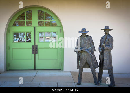 Bronze statues of Doc Holiday and Wyatt Earp commemorating the shooting ...
