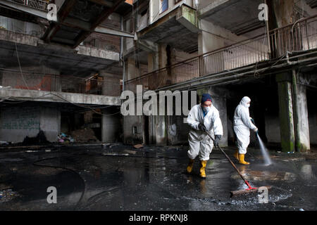 A cleaning team working inside one of the buildings known as the vele ...