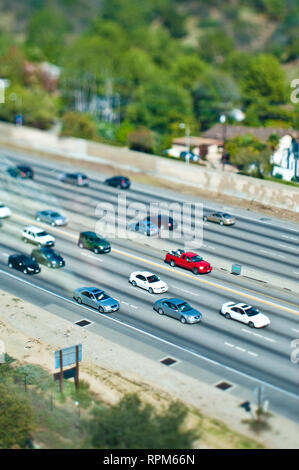 A vertical shallow focus of toy cars on a carpet - Lightning McQueen ...