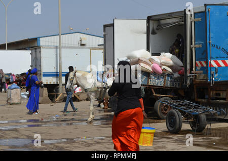 Trucks at the parking lot of Mbour fish market Stock Photo - Alamy