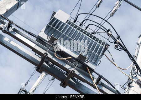 Electricity distribution transformer with cooling ribs Stock Photo - Alamy
