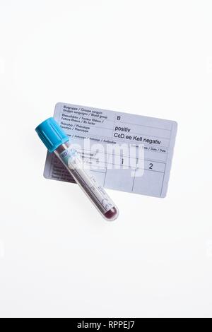 Blood group test with certificate and blood sample Stock Photo - Alamy