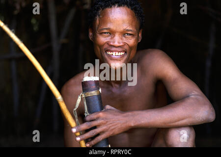 Bushman/San People. Male San hunters armed with traditional bow and ...